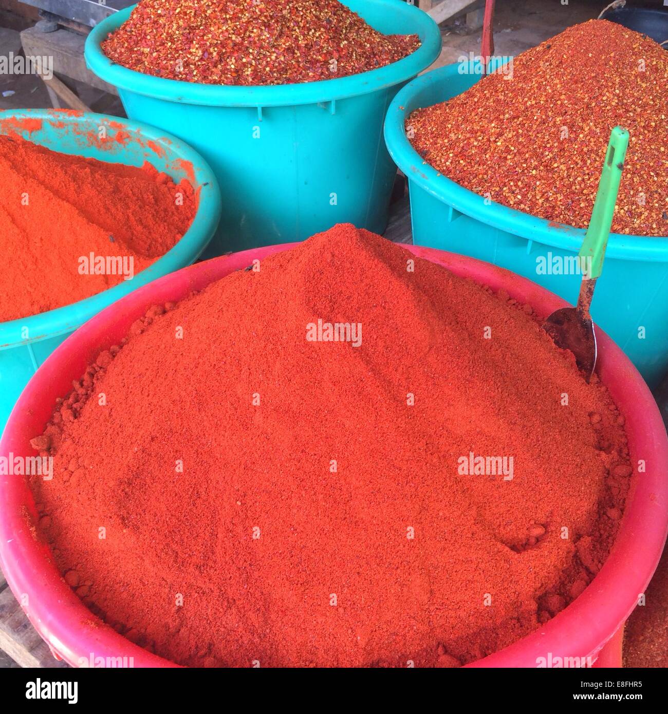 Buckets of ground Chilli at market, Vietnam Stock Photo - Alamy