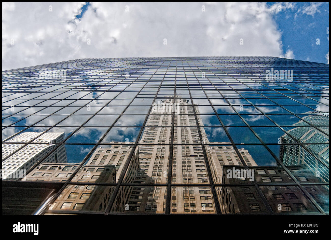 Chrysler building and skyscraper reflections in glass building, New York, america, USA Stock ...