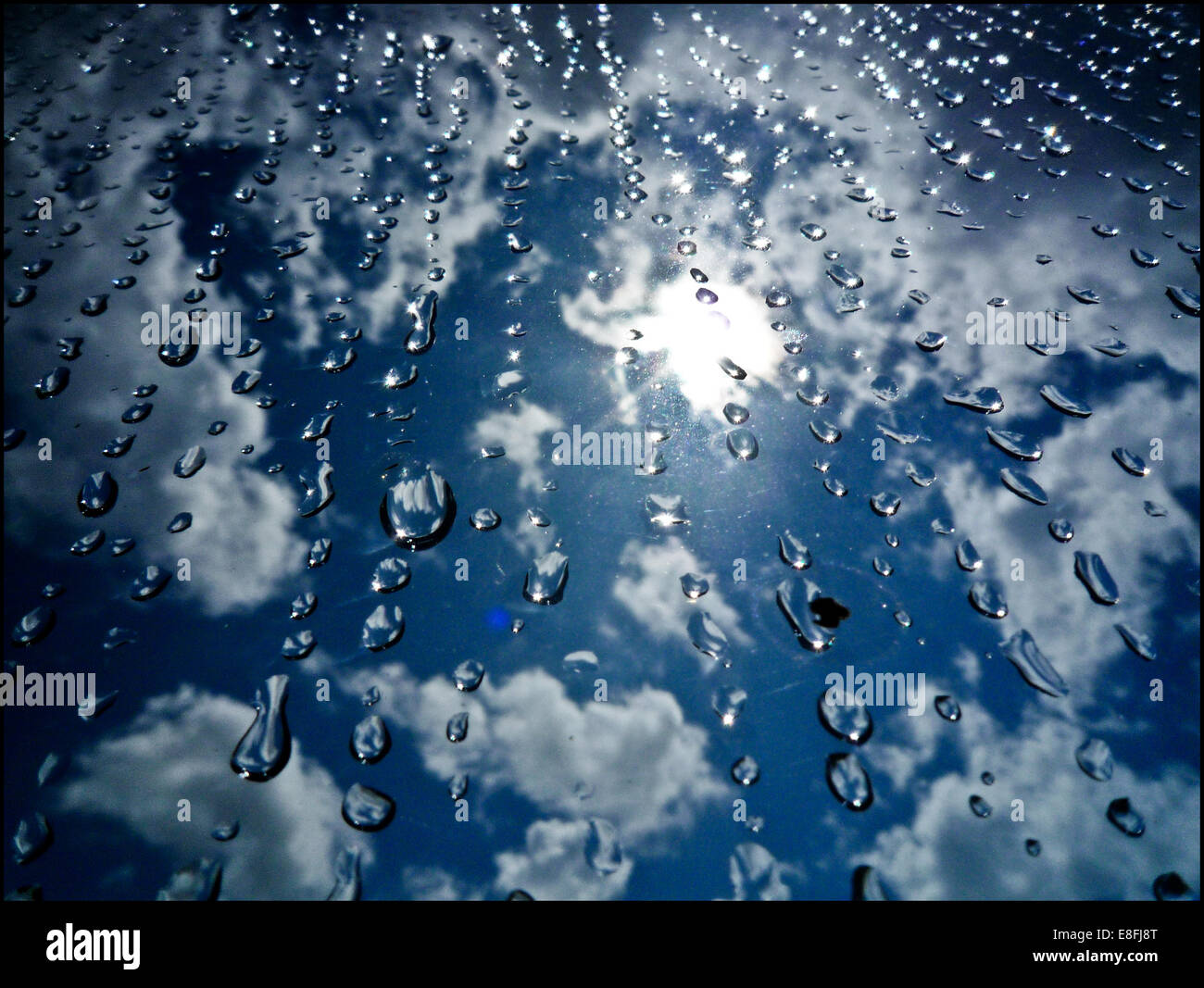 Lens flare clouds sun hi-res stock photography and images - Alamy