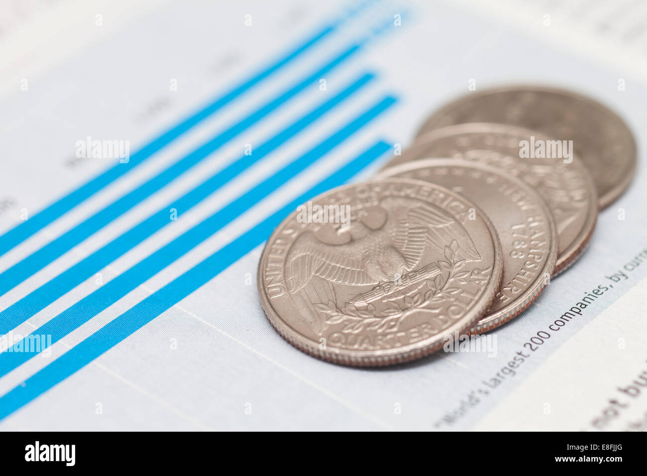 Close-up of a stack of American coins on a financial graph Stock Photo ...