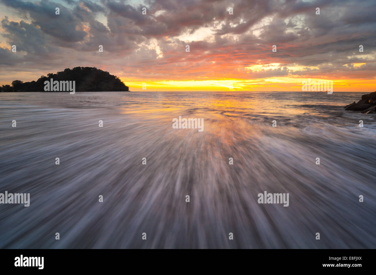 Indonesia, Padang, Taplau Beach, Wave and sunset Stock Photo - Alamy