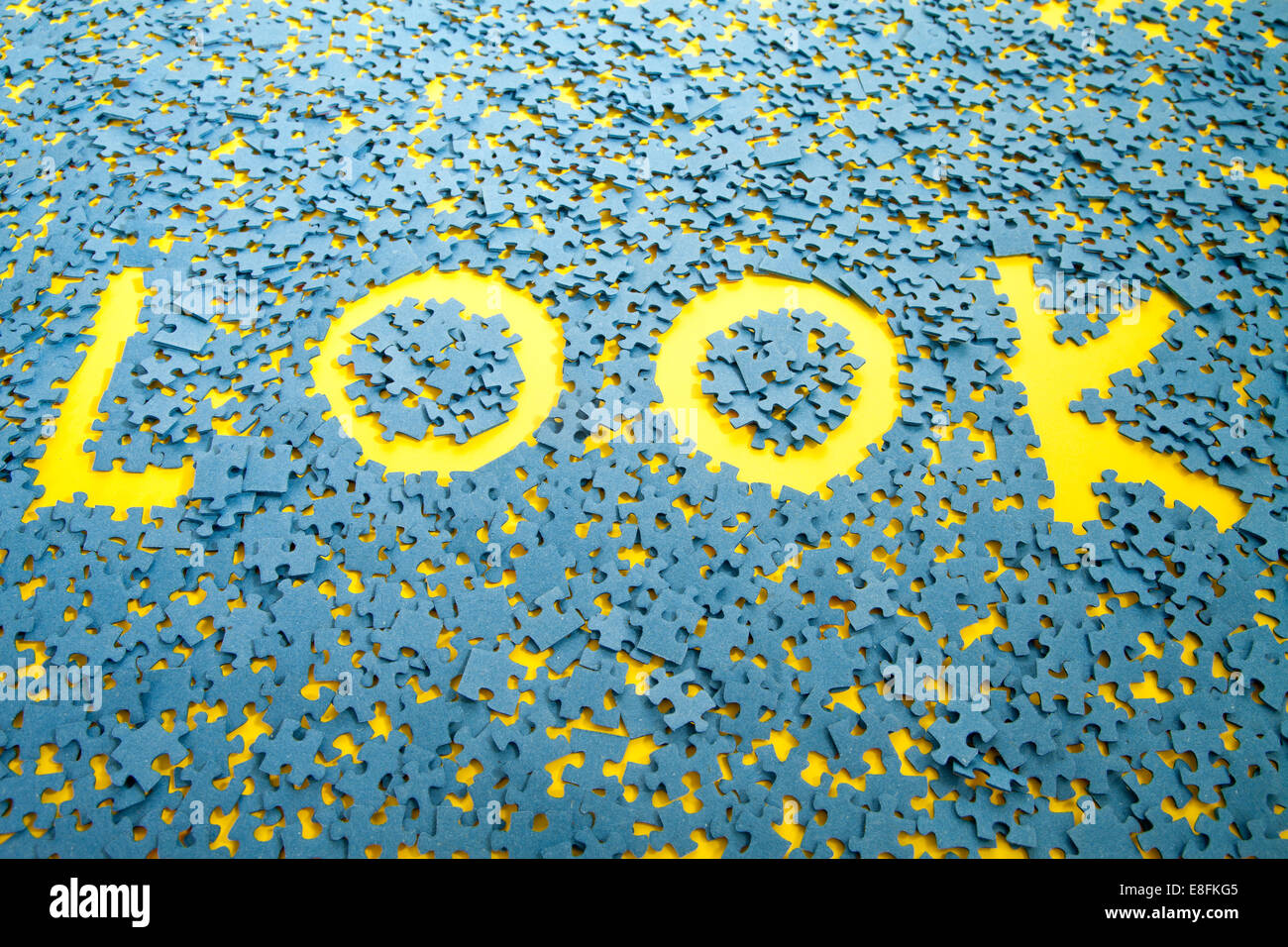 The word Look spelled out between jigsaw pieces Stock Photo - Alamy
