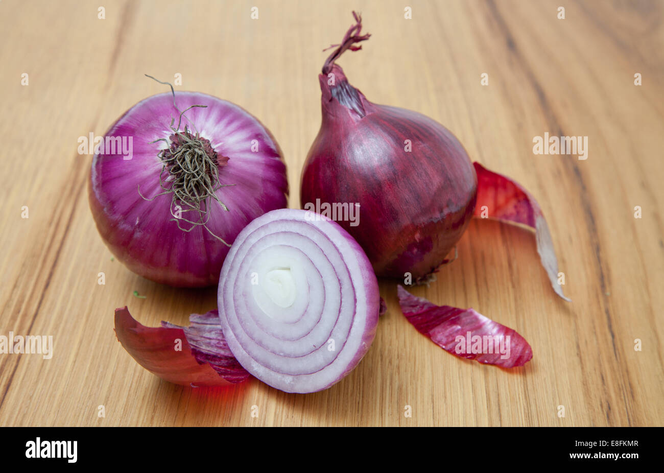 Close-up of peeled Red Onions and half an onion Stock Photo - Alamy
