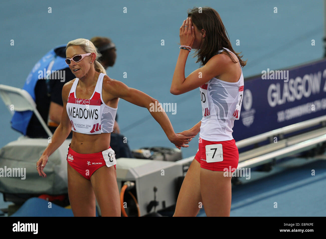 Jessica Judd (ENG) looks distraught after coming in 4th and is led away ...