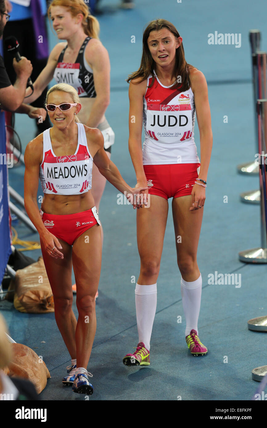 Jessica Judd (ENG) looks distraught after coming in 4th and is led away ...