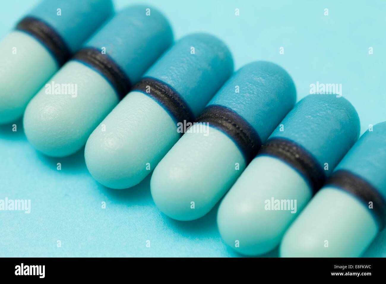 Row of capsules Stock Photo - Alamy