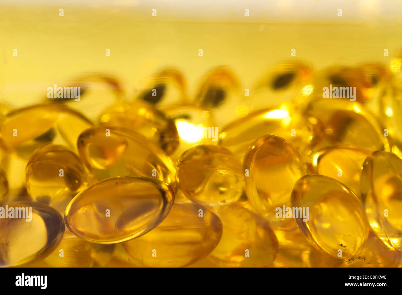 Cod liver oil capsules Stock Photo - Alamy