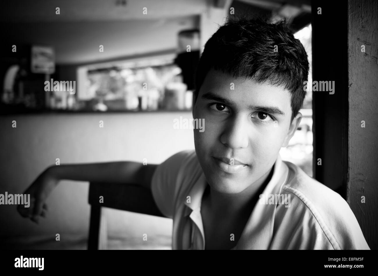 Portrait of a man Sitting In A Cafe Stock Photo - Alamy