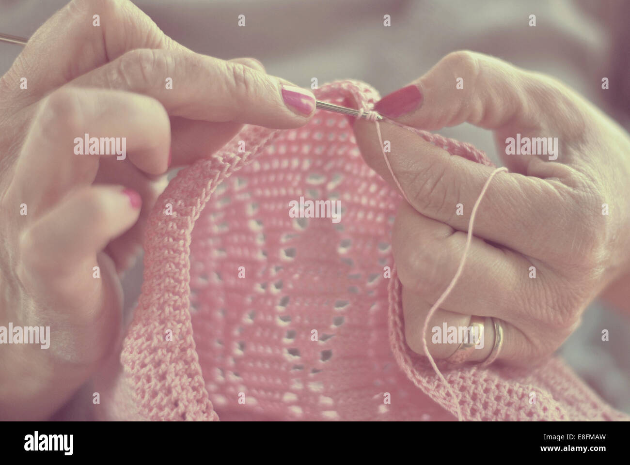 Close up of woman's hands crocheting Stock Photo - Alamy