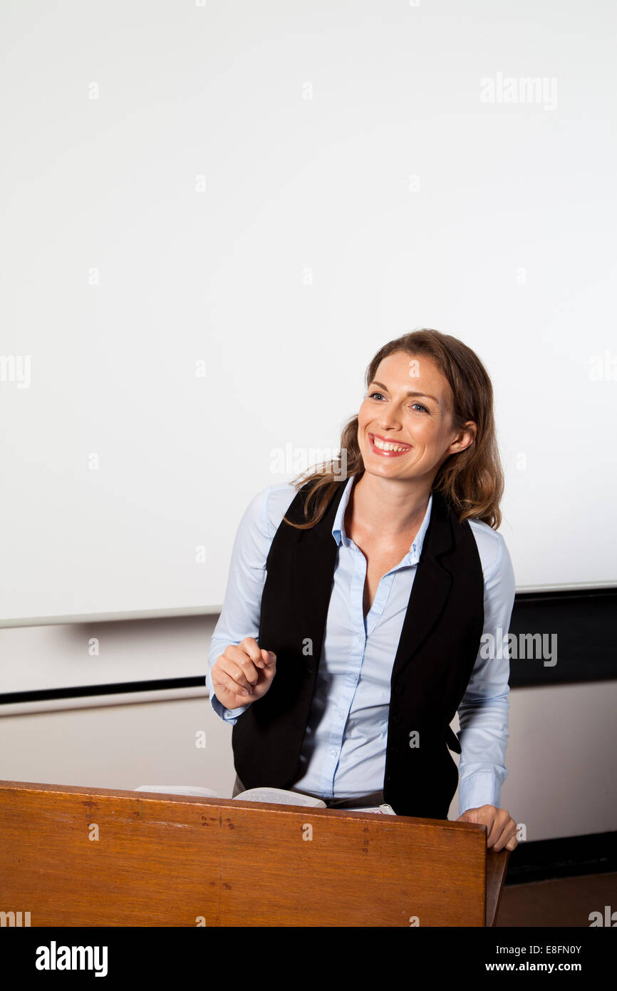 Woman giving presentation Stock Photo - Alamy