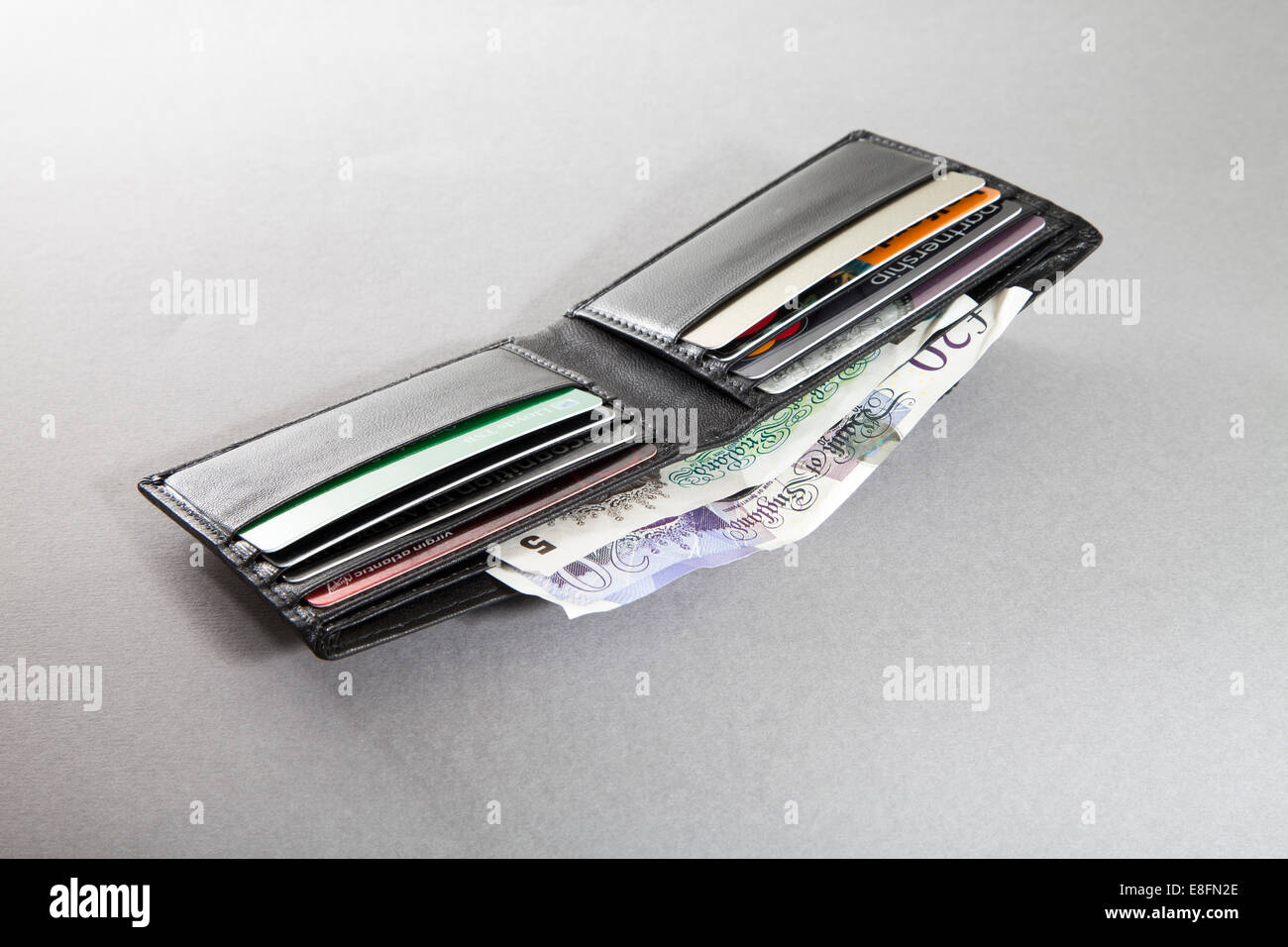 Open wallet with British banknotes Stock Photo - Alamy