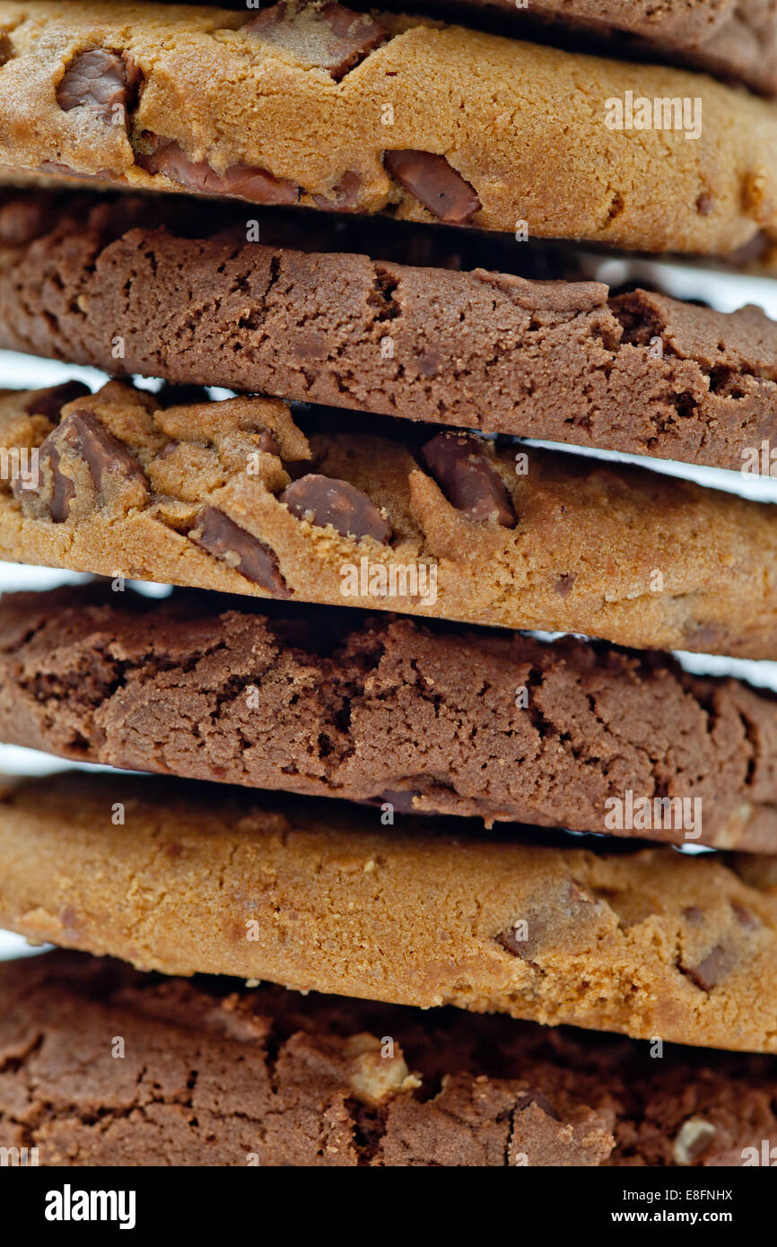 Full frame close-up of a stack of chocolate chip cookies on a table ...