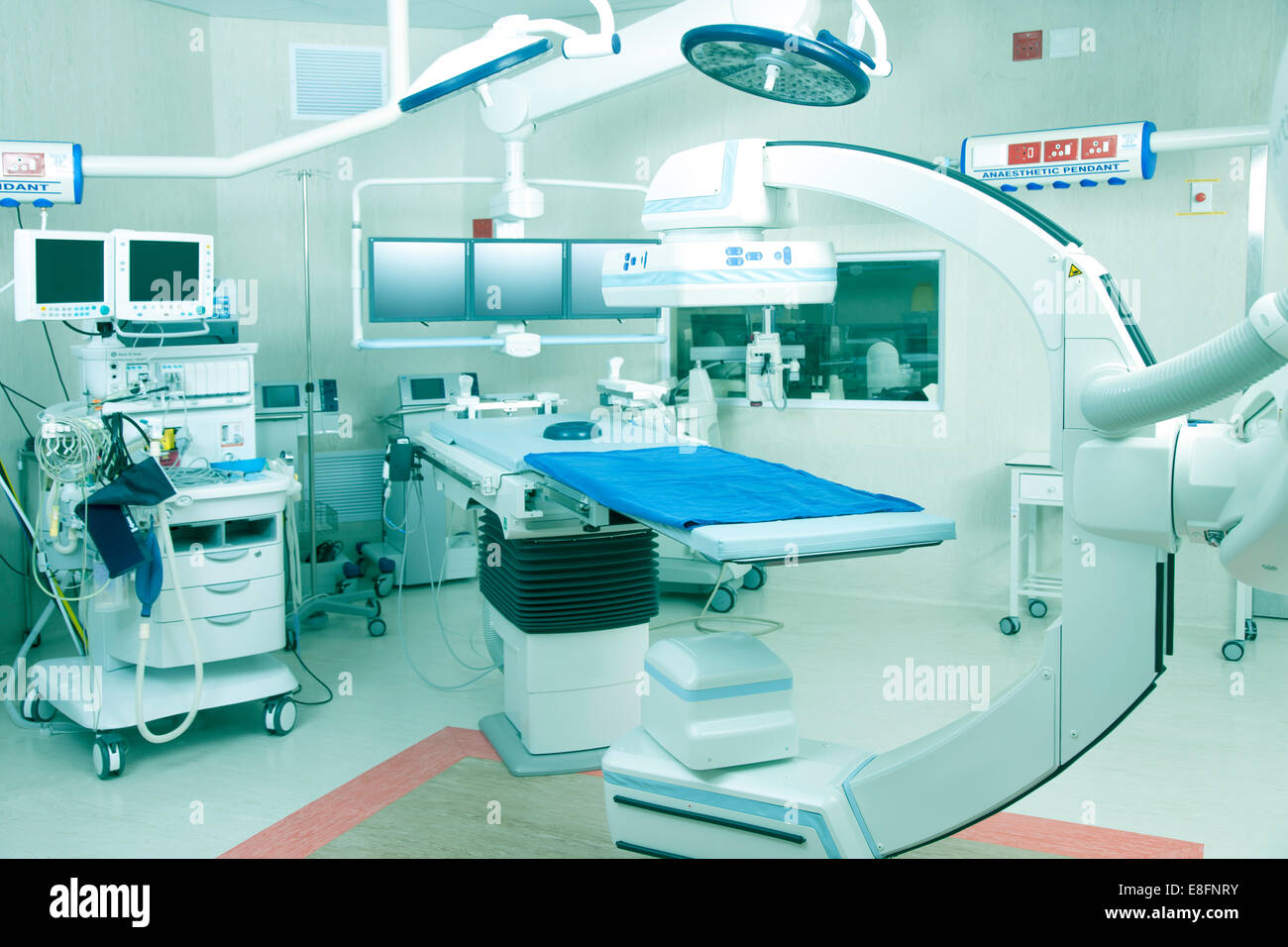 Operating room in hospital with robotic imaging system Stock Photo - Alamy