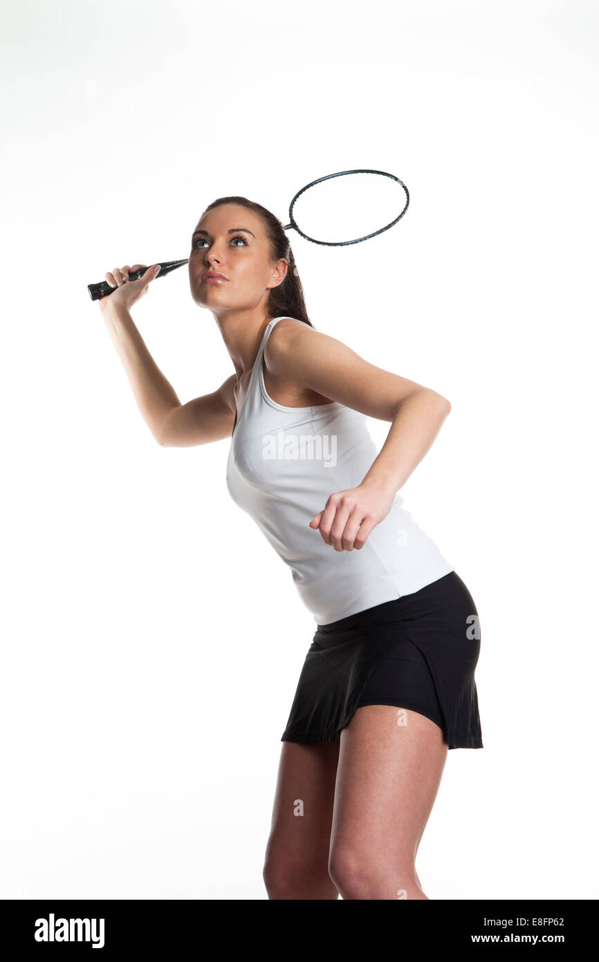 Young woman playing Badminton Stock Photo - Alamy