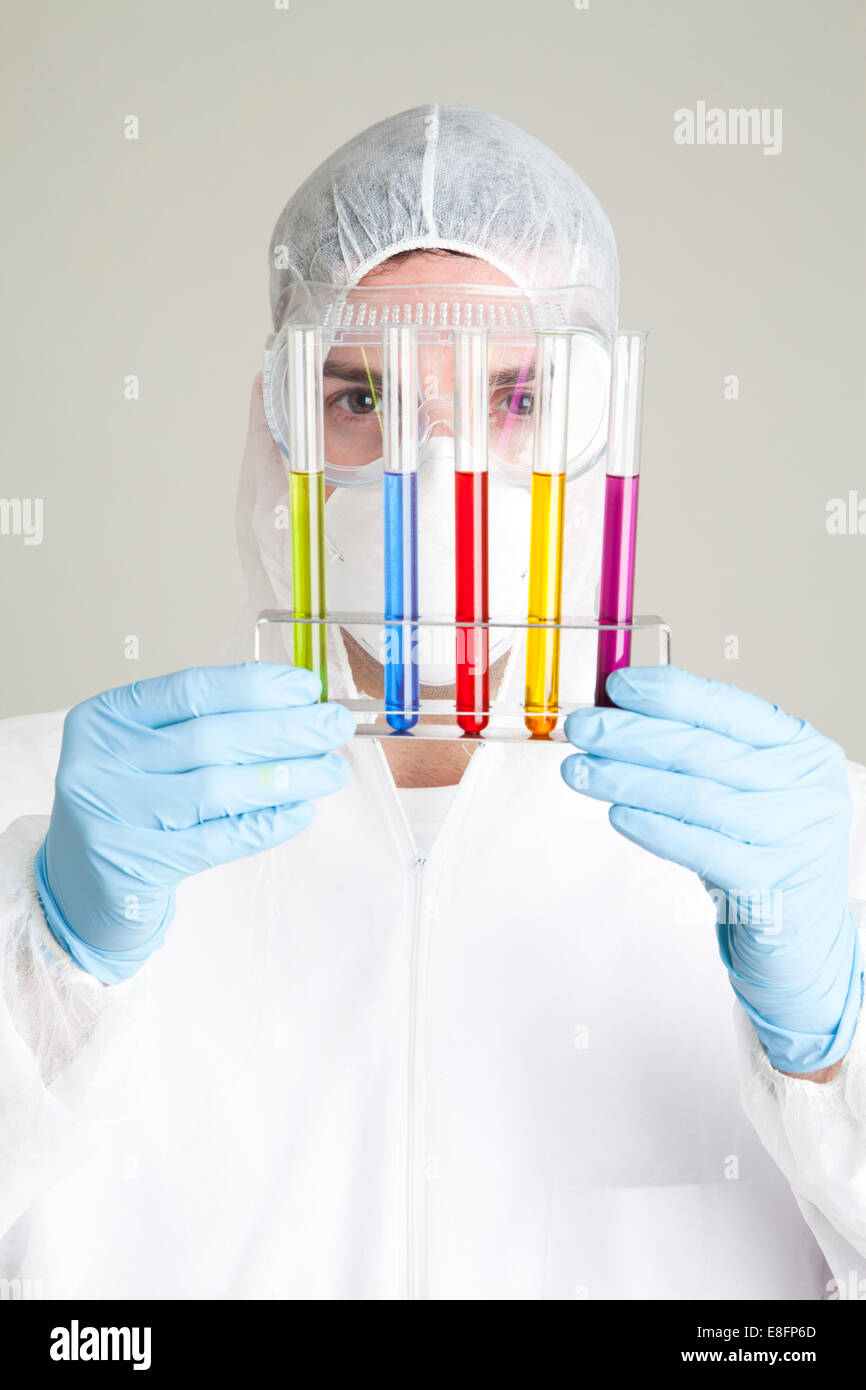 Scientist holding rack of test tubes Stock Photo - Alamy