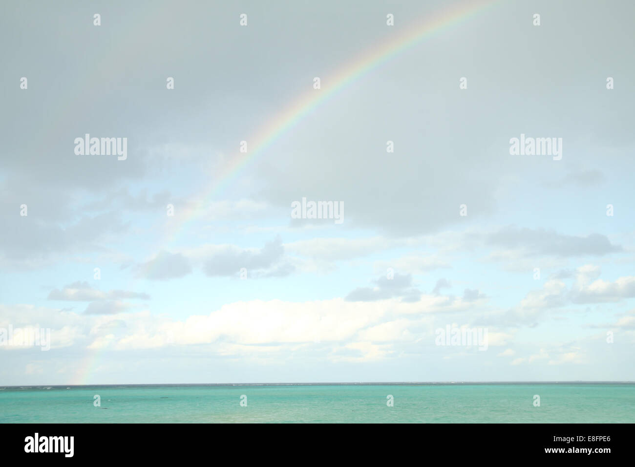 Rainbow over ocean, Japan Stock Photo - Alamy