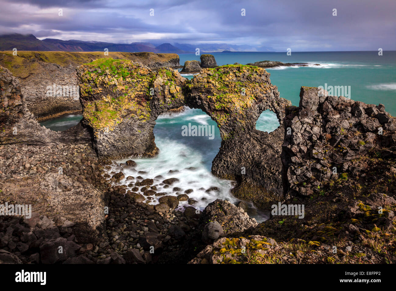 Londrangar Basalt Cliffs and the natural arch in Iceland Stock Photo ...