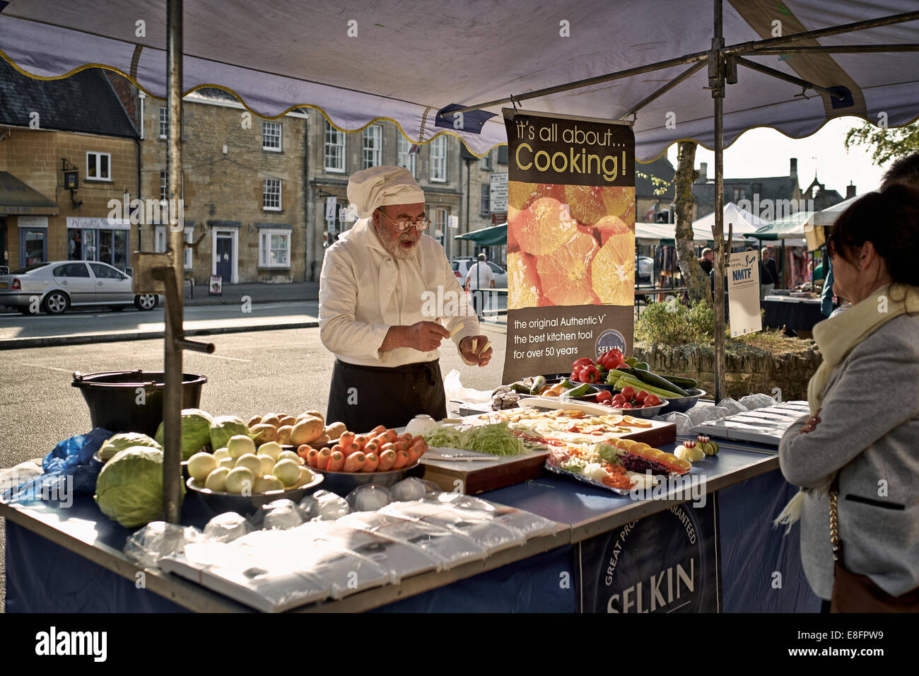 Chef demonstrating cooking utensils and technique at Moreton in Marsh ...