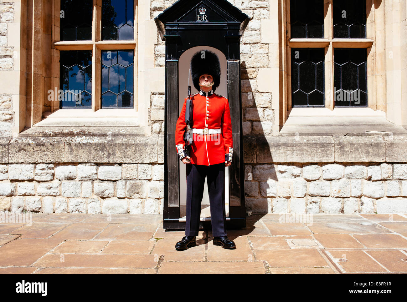 Beefeater standing at Tower of London, England, United Kingdom Stock ...