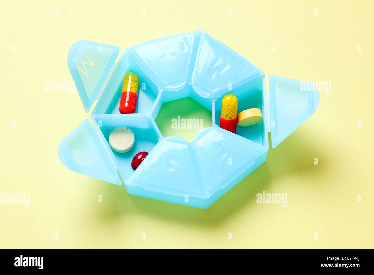 Elevated view of plastic pill box Stock Photo - Alamy