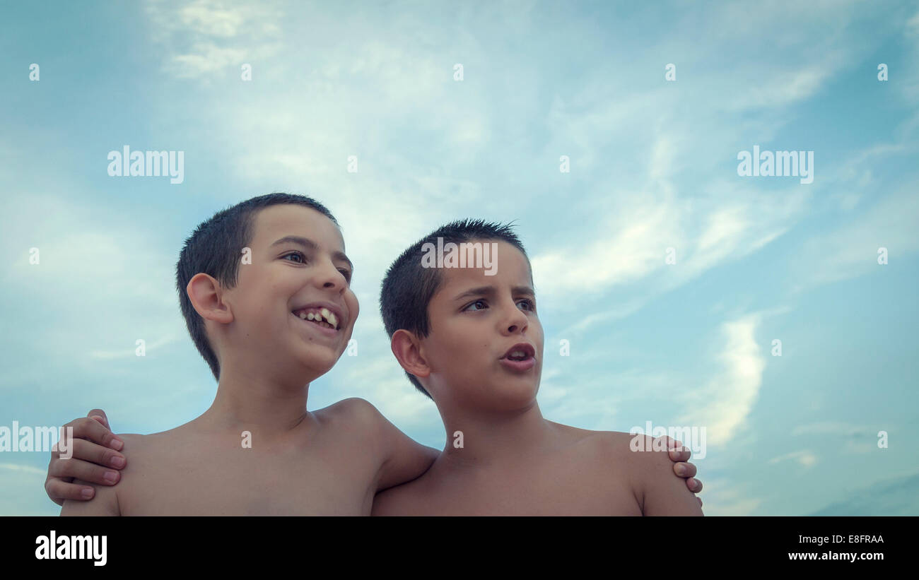 Two friends hugging teenager hi-res stock photography and images - Alamy