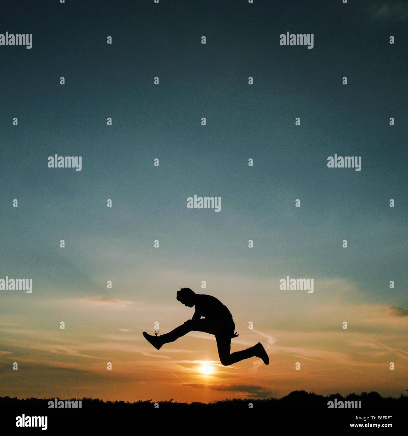 Silhouette man jumping hi-res stock photography and images - Alamy