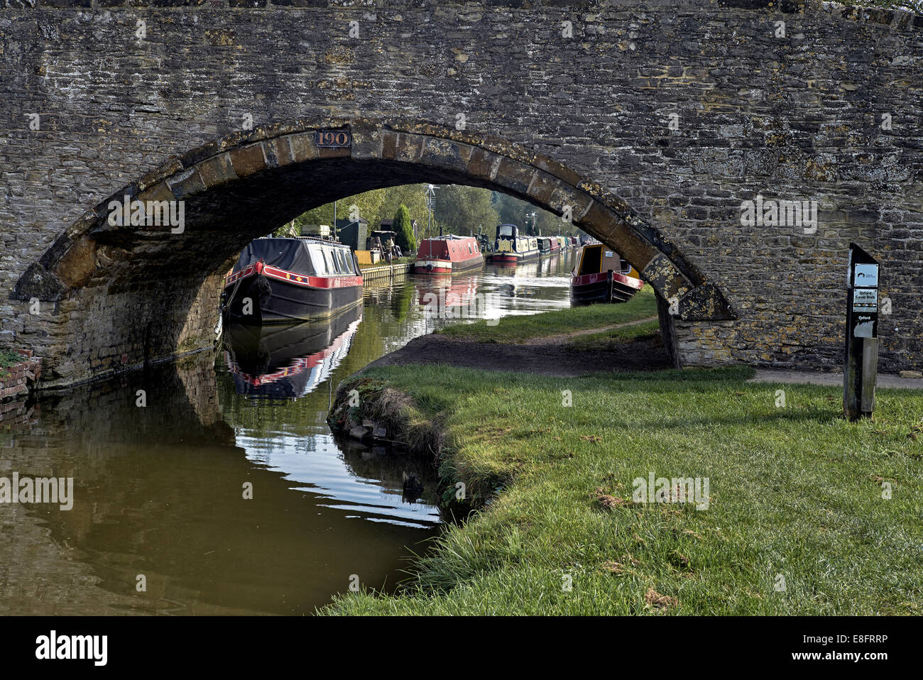 Oxford canal. Aynho Wharf boatyard and Cotswold stone bridge on the ...