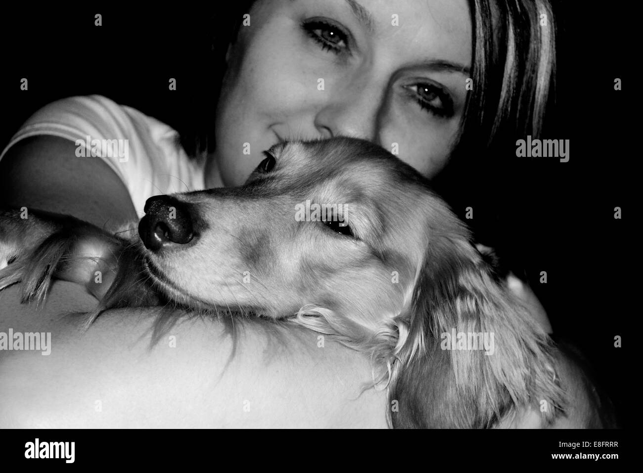 USA, Florida, Seminole Country, Woman hugging dog Stock Photo - Alamy