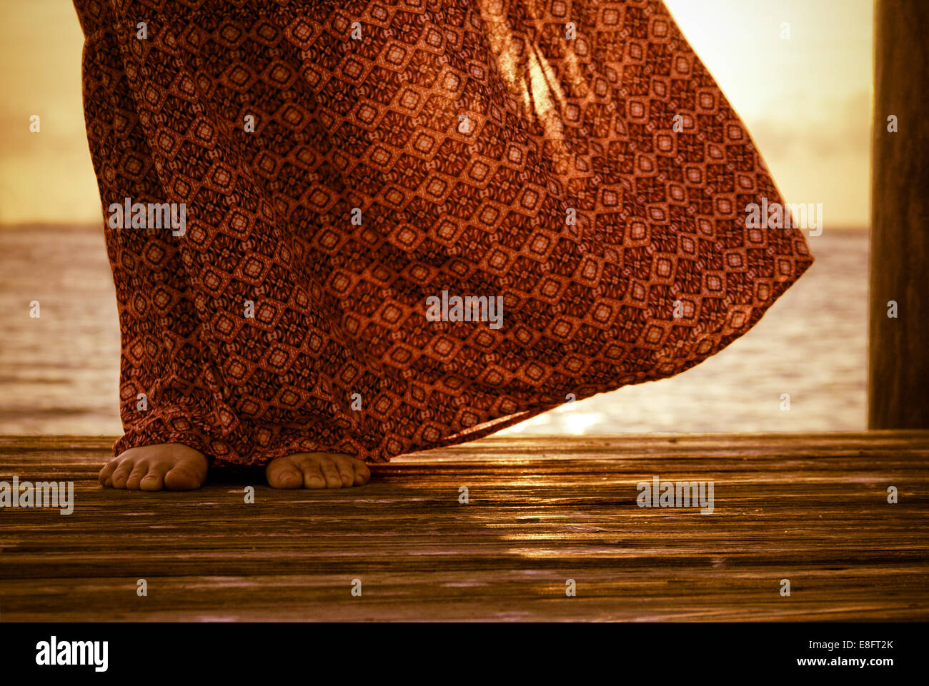 Wind blowing dress up hi-res stock photography and images - Alamy