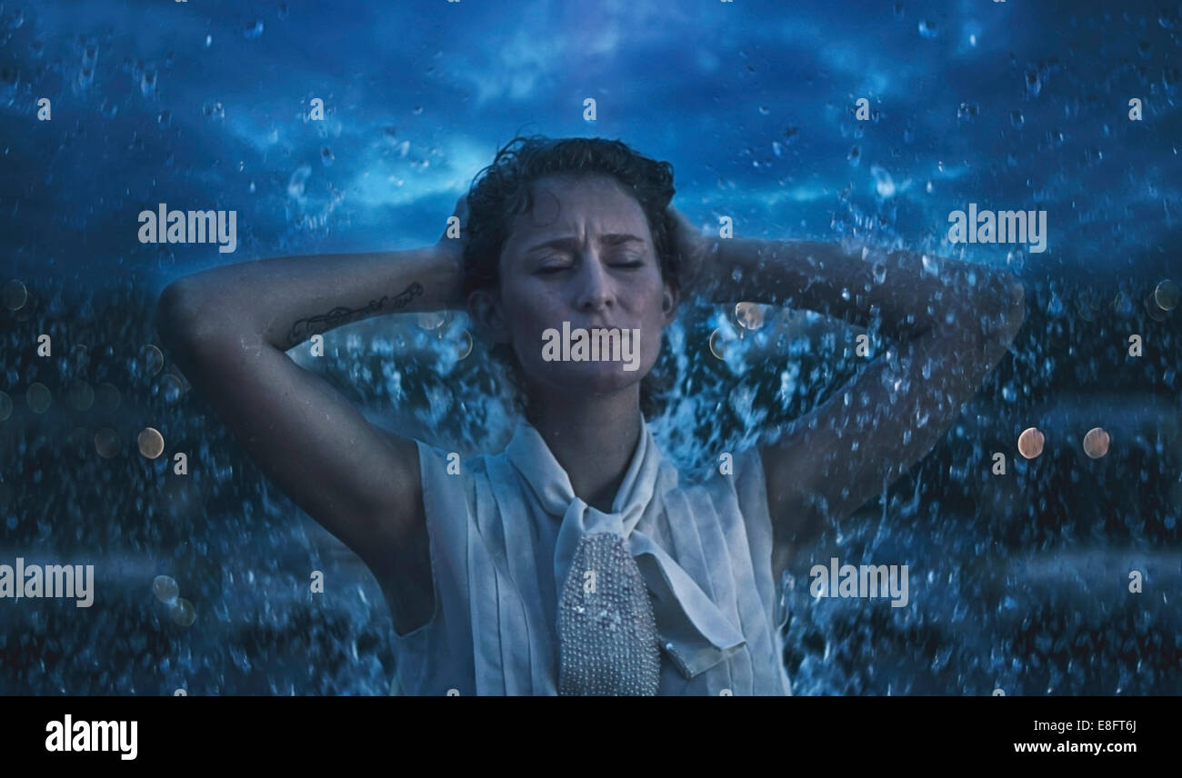 Girl Standing In The Rain
