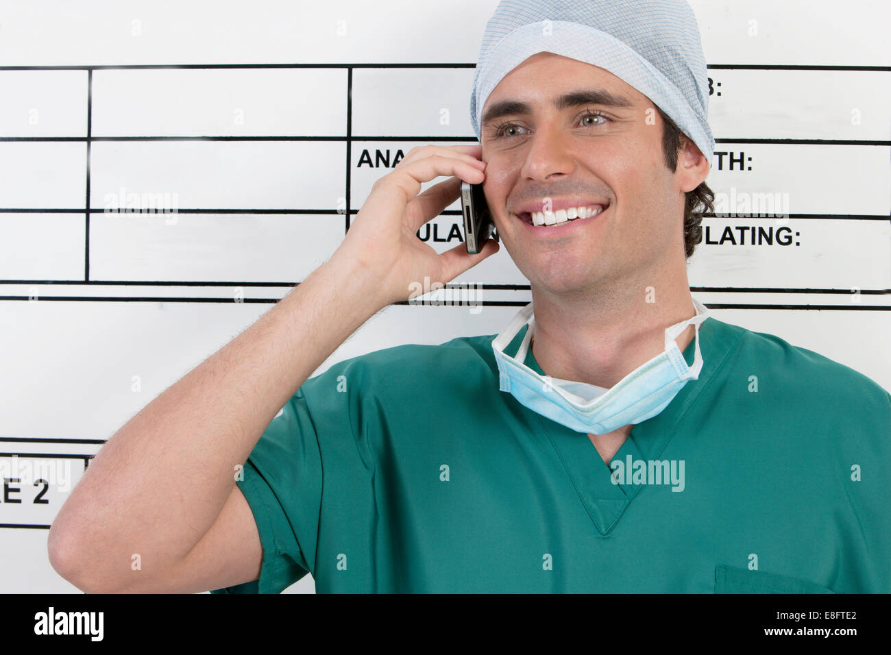 Surgeon talking on his mobile phone hi-res stock photography and images ...