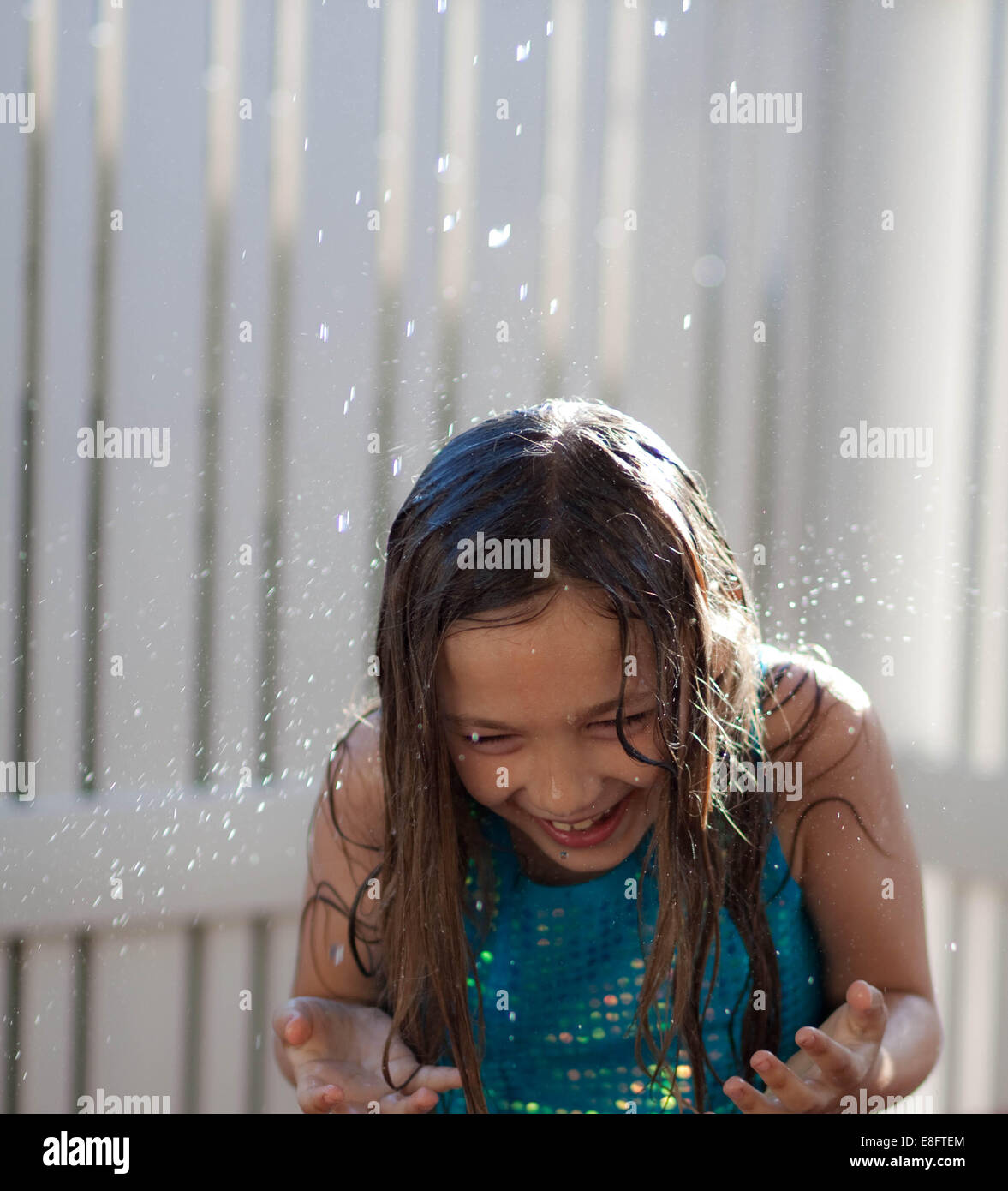Girl sprayed with water hi-res stock photography and images - Alamy