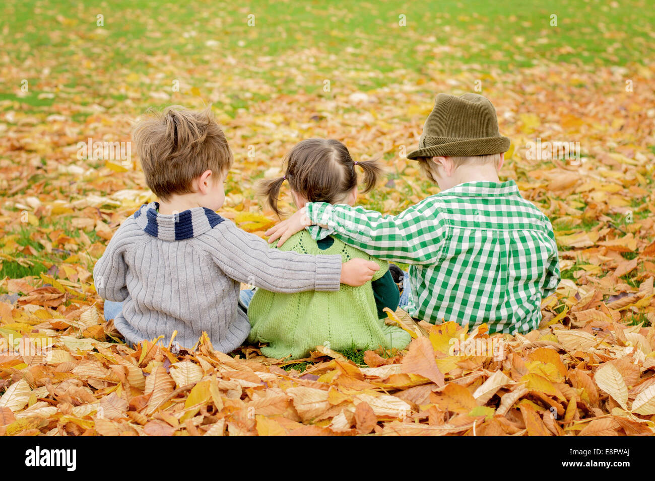 Children arms around each other hi-res stock photography and images - Alamy