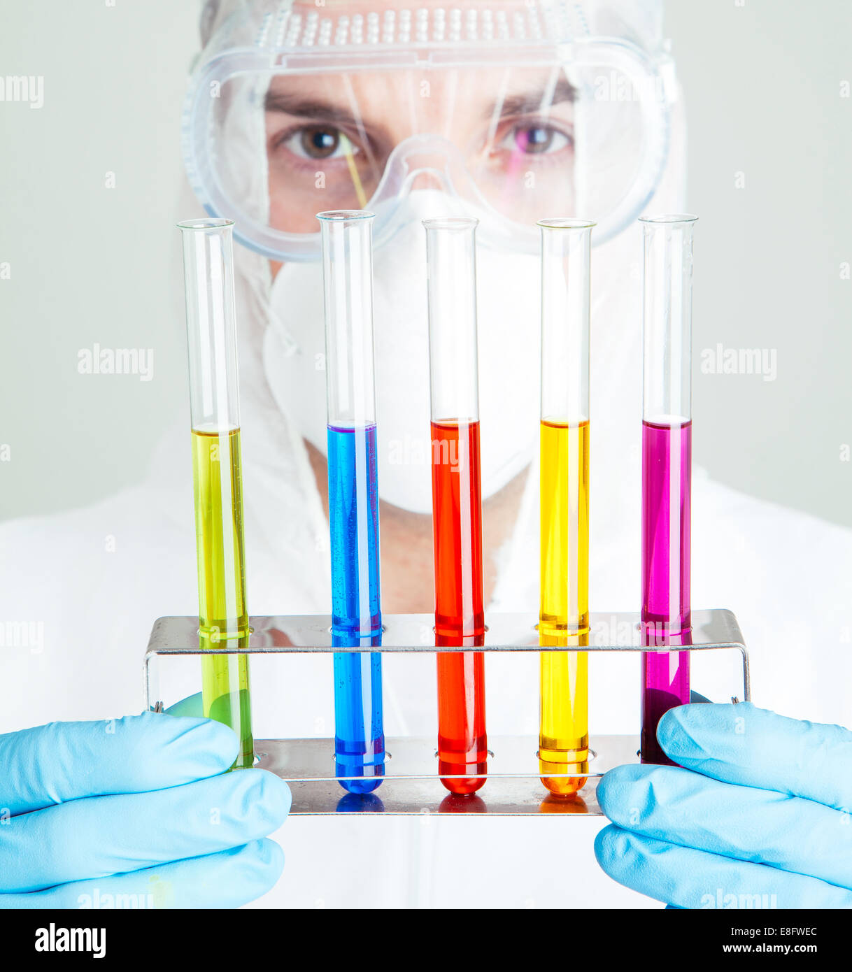 Scientist holding rack test tubes hi-res stock photography and images ...