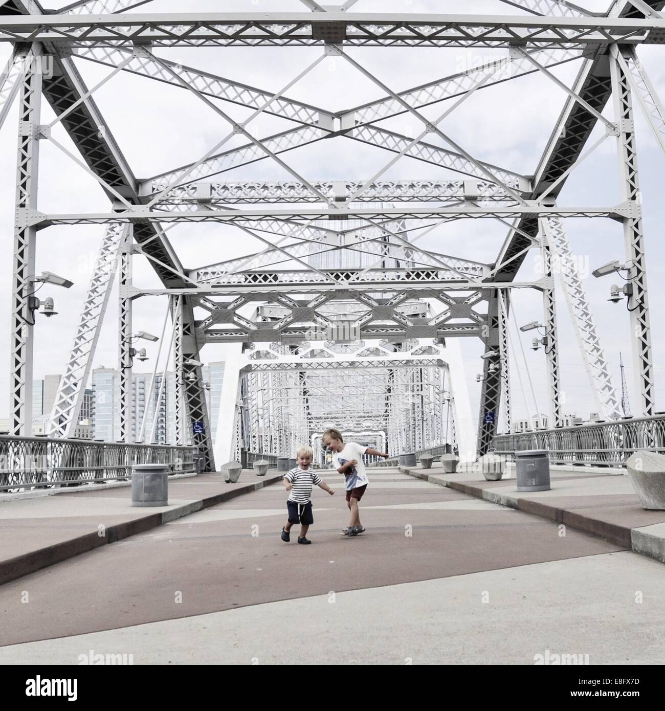 Boys dancing on bridge Stock Photo - Alamy