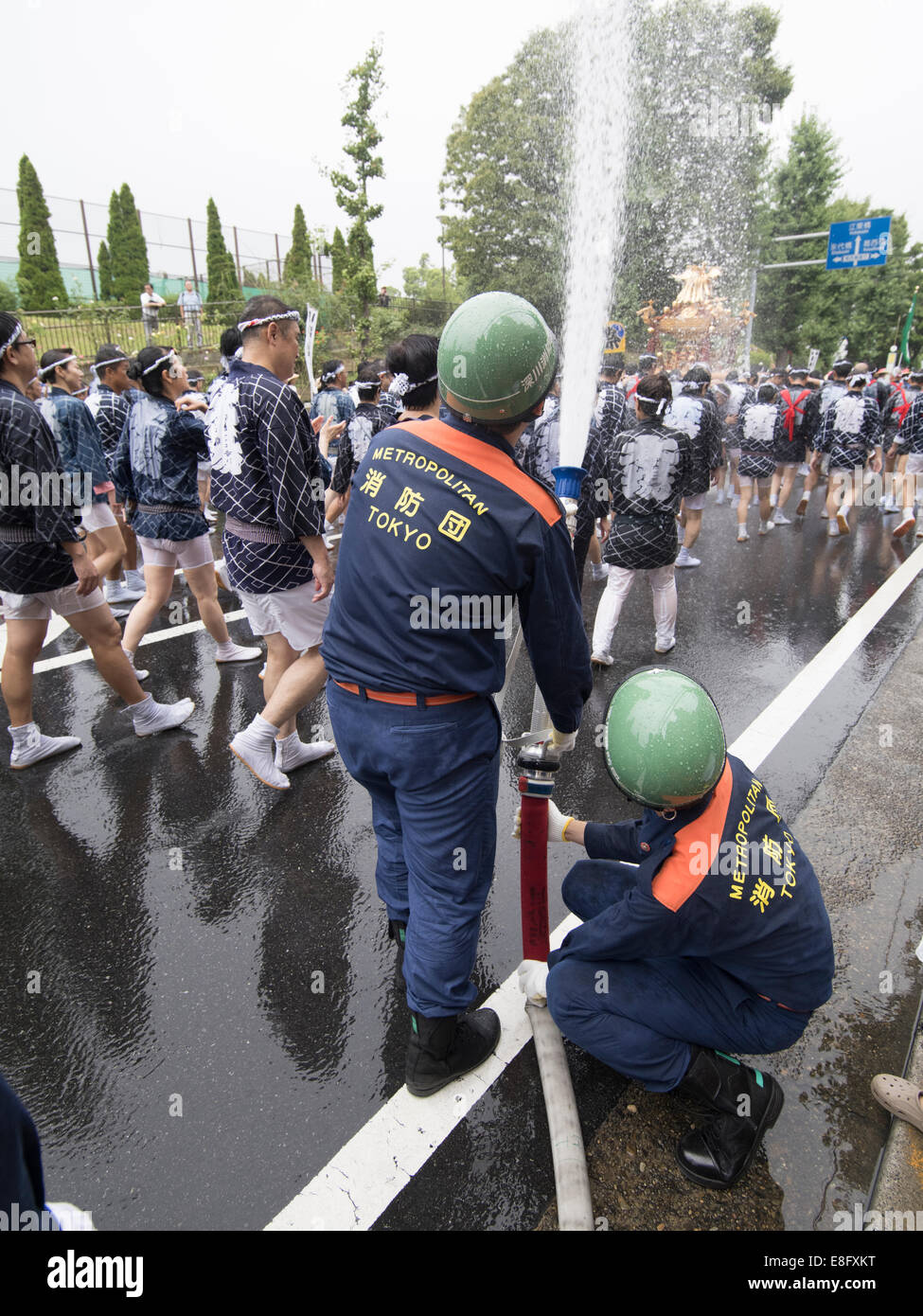 Firefighters soak the mikoshi at Fukagawa Fetival aka water throwing ...