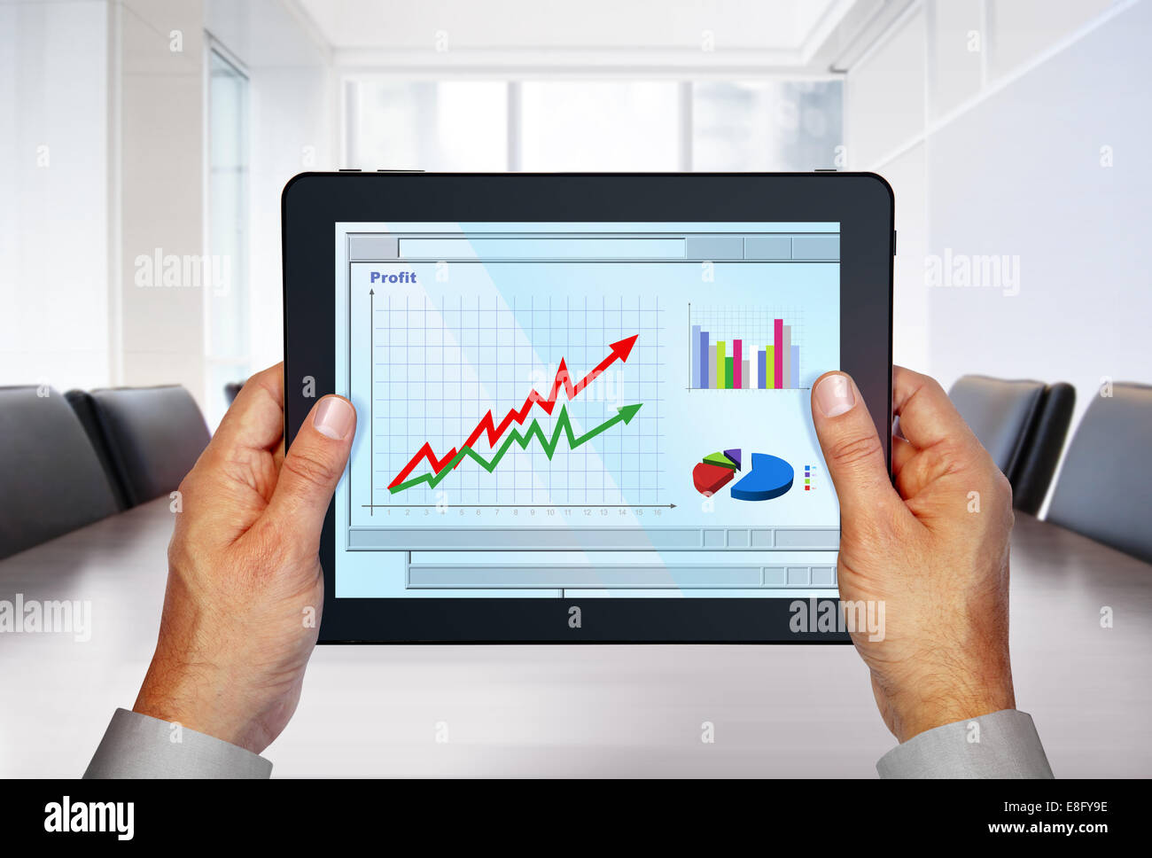 touch pad with computer graphics on screen in hands Stock Photo - Alamy