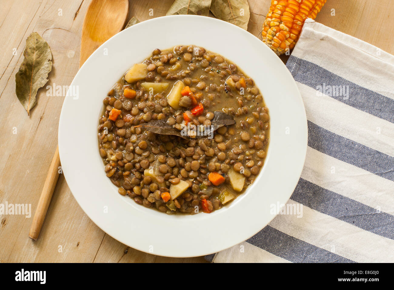 lentil with vegetables served on white plate Stock Photo - Alamy