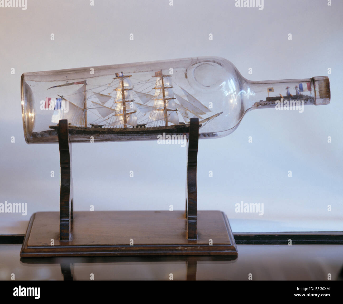 Close-up of an antique ship in a bottle Stock Photo - Alamy