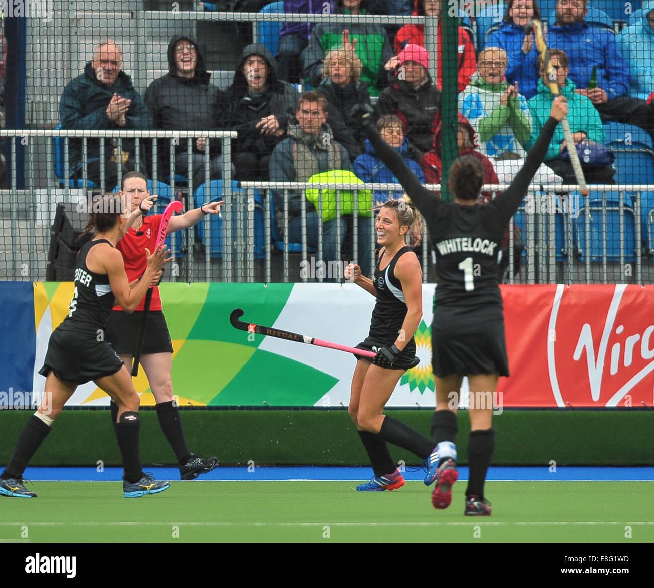 Captain Kayla Whitelock (NZL) raises her arms to celebrate the goal ...