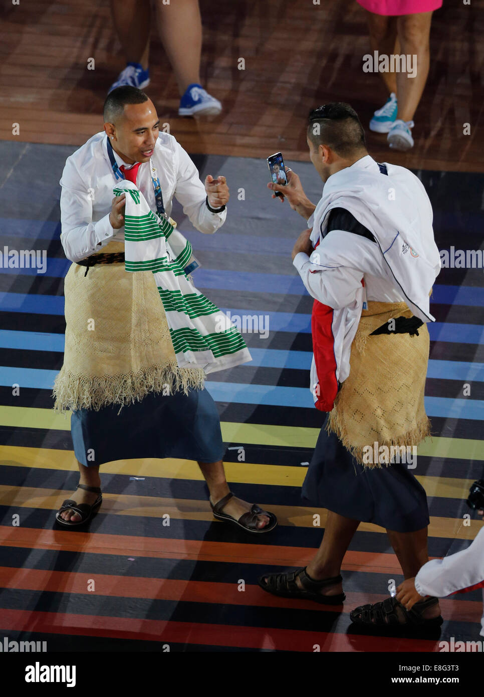 Tonga boxer Lomalito Moala holds a Celtic shirt during the athletes ...