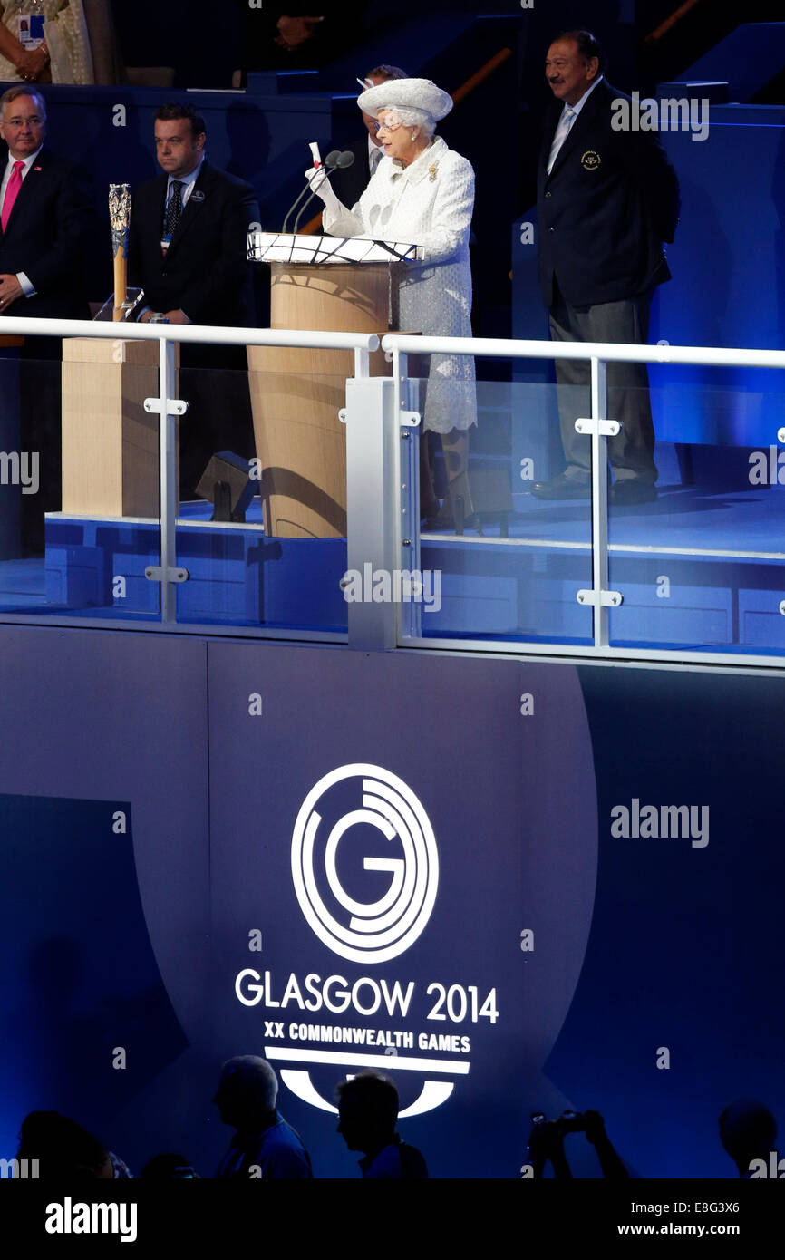 Queen Elizabeth II reads the message contained in the Baton. Opening ...