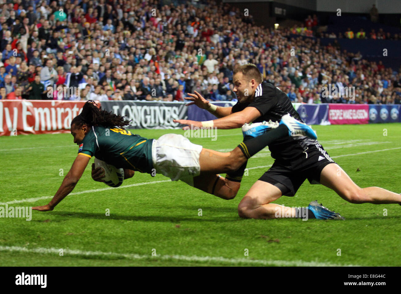 Cecil Afrika (RSA) dives over the line for what turns out to be the ...