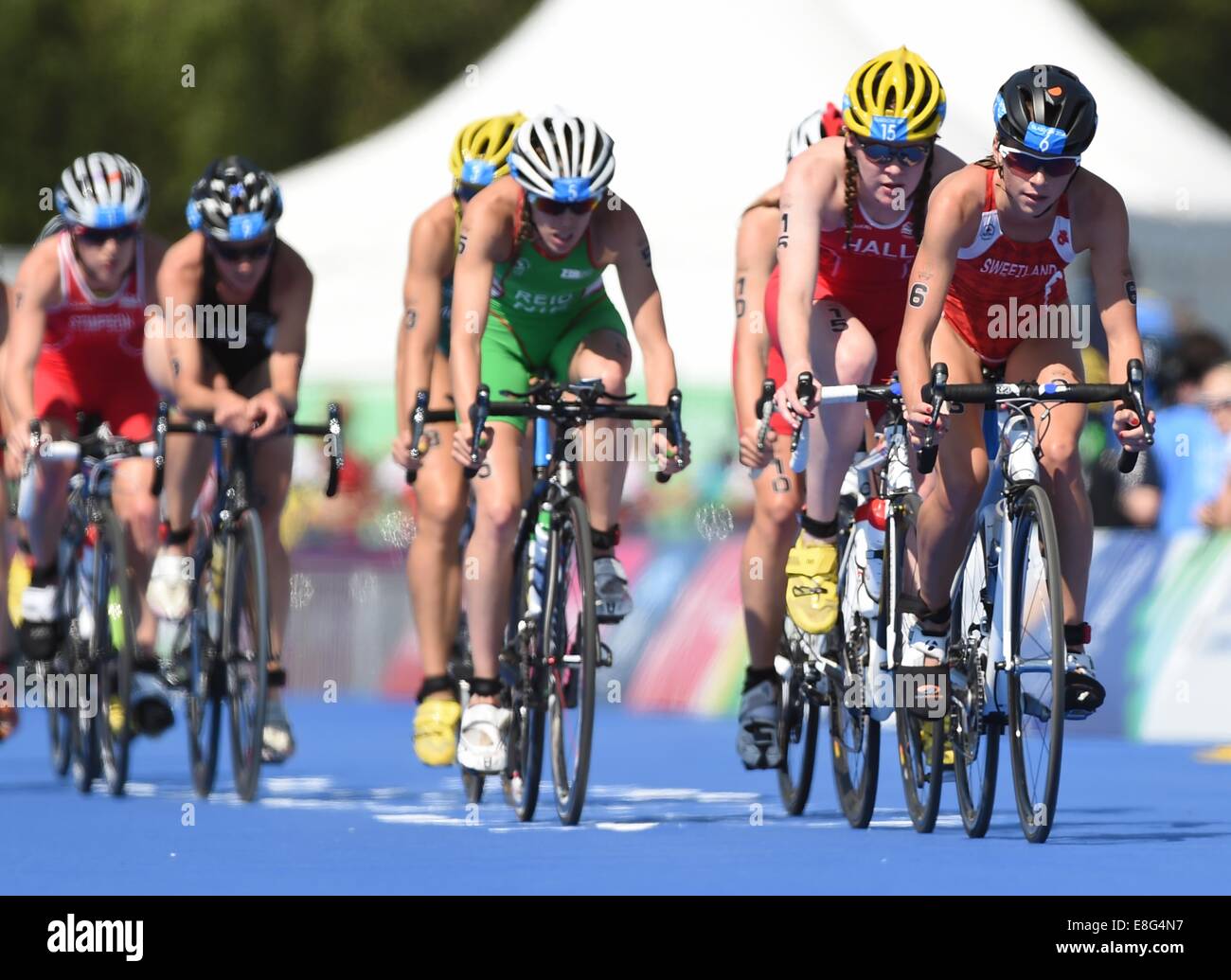 Kirsten Sweetland (CAN ) leads the peleton in the Women's Triathlon ...