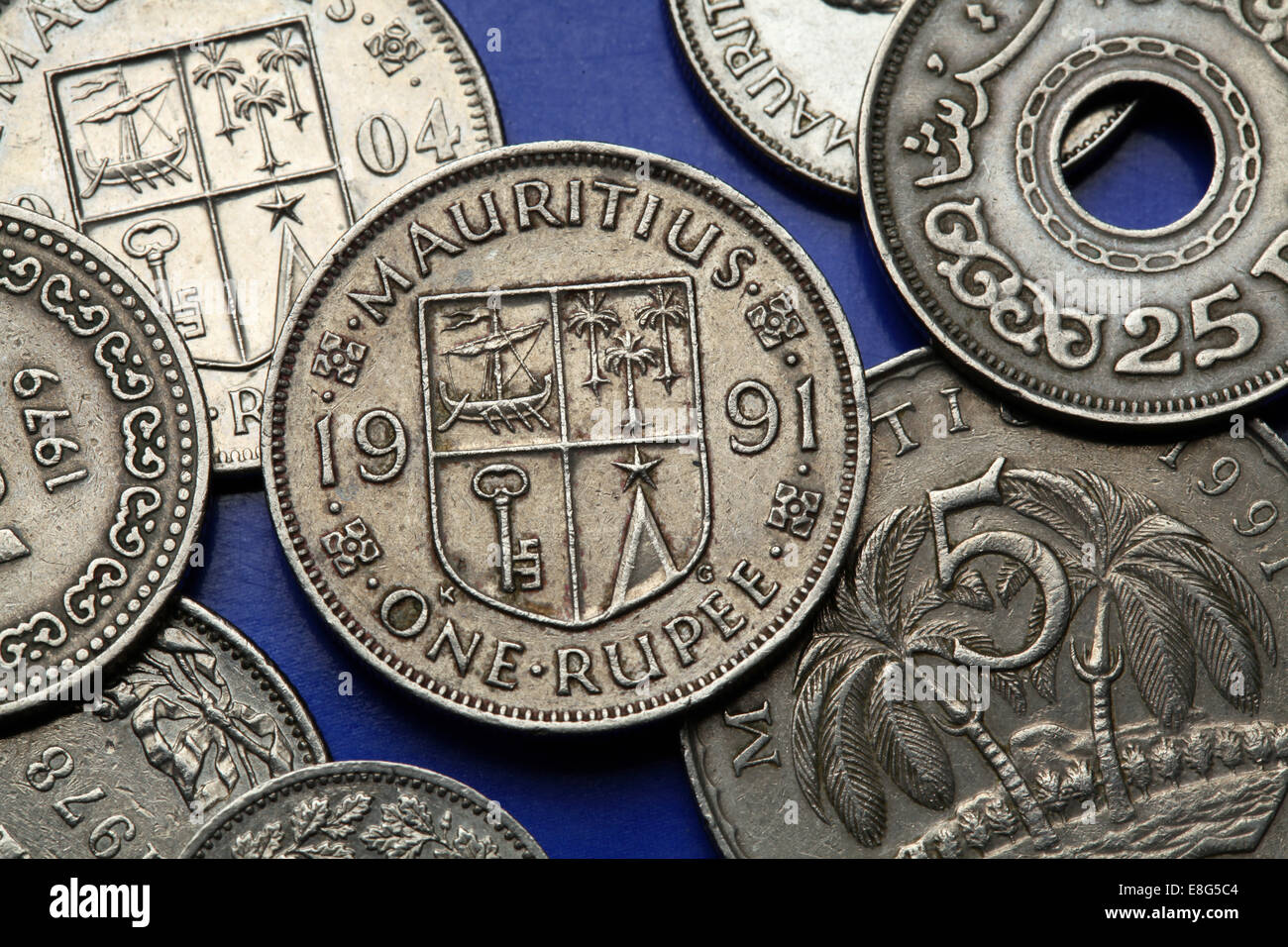 Coins of Mauritius. Mauritian national coat of arms depicted in the ...