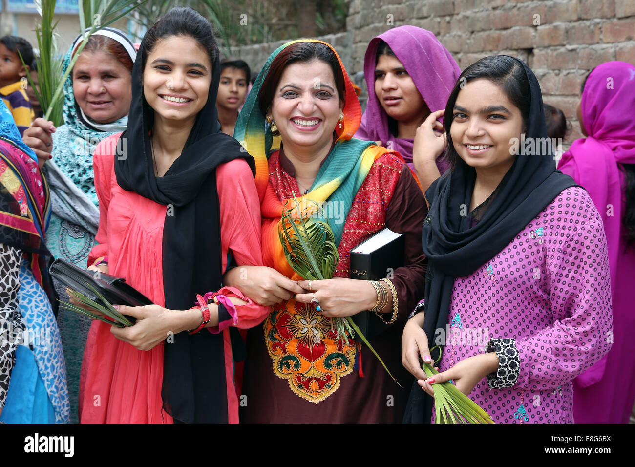 Catholic christian women march during the Palm Sunday procession ...
