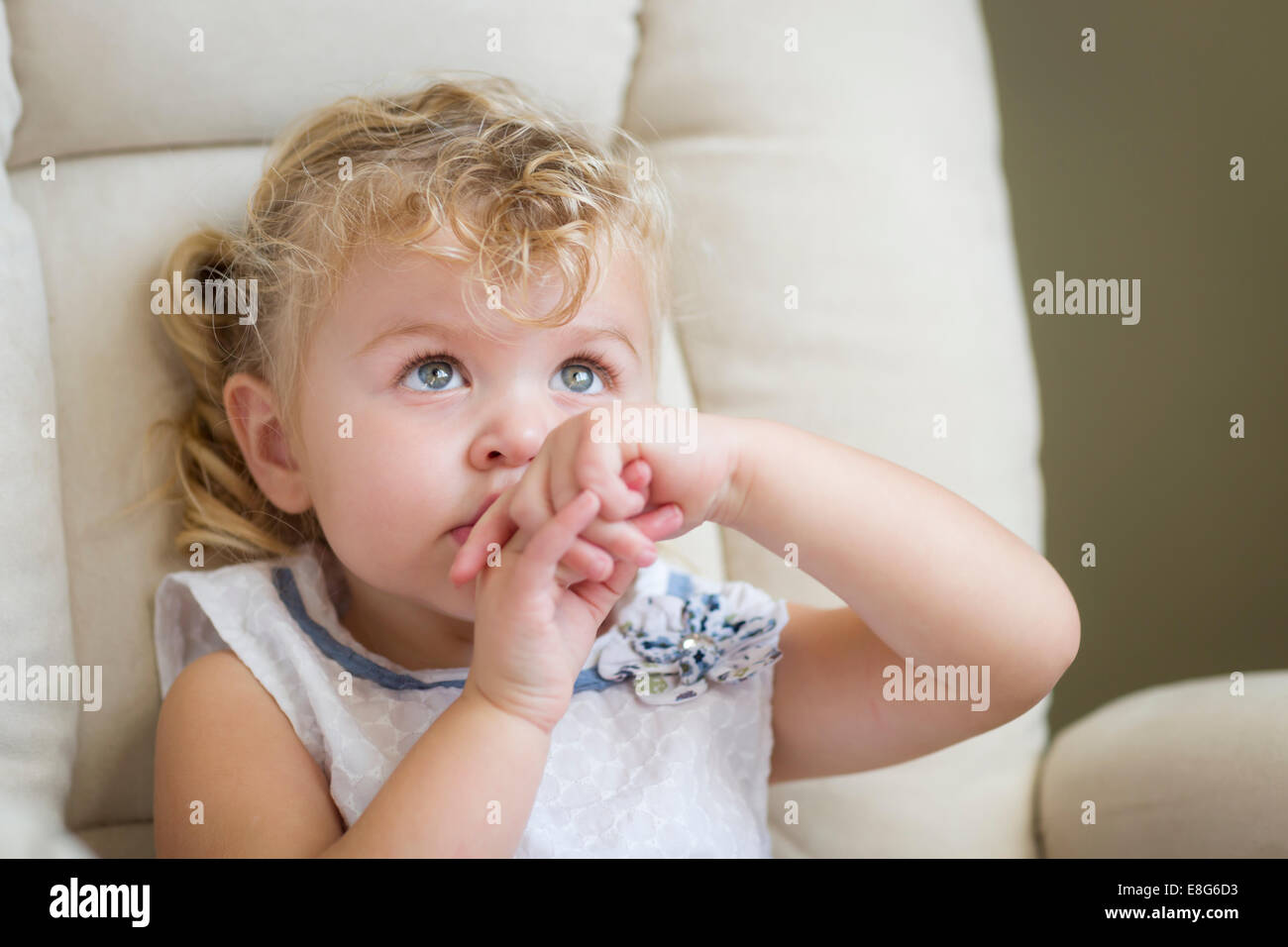 Cute little scared baby girl hi-res stock photography and images - Alamy