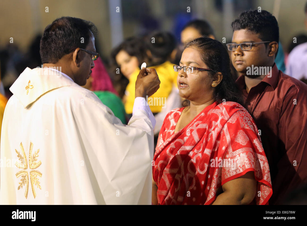Holy communion during easter sunday mass service at roman catholic ...