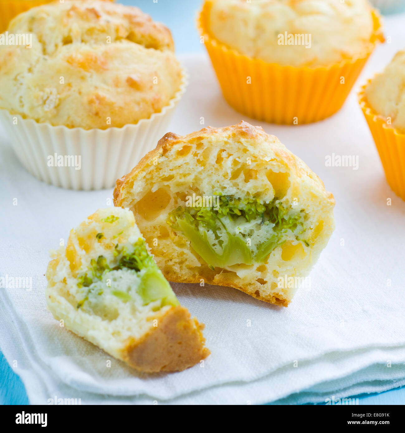 Cheesy muffin with a whole broccoli inside Stock Photo - Alamy