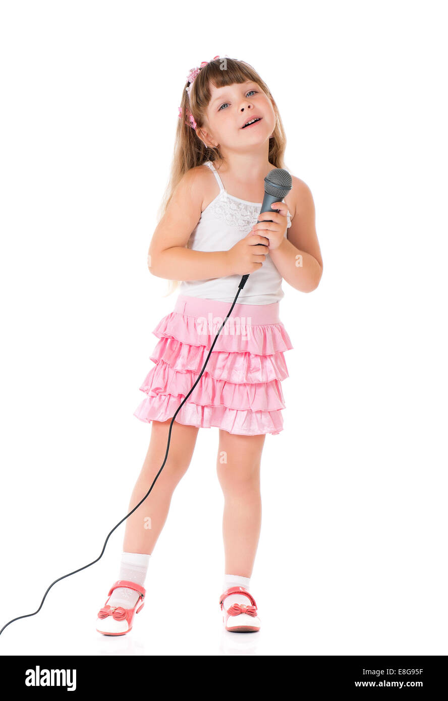 Girl with microphone Stock Photo - Alamy